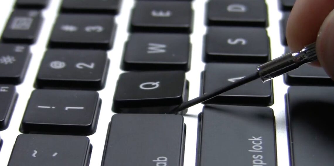 Hoe de knoppen (s) van een MacBook Pro / MacBook -toetsenbord te ...